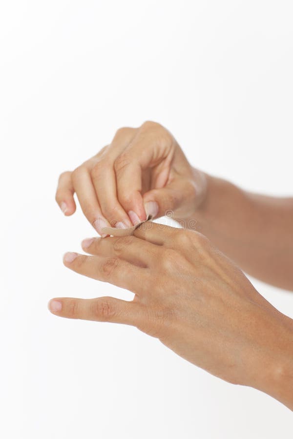 Adhesive bandage on hand stock photo. Image of sticking - 22321482