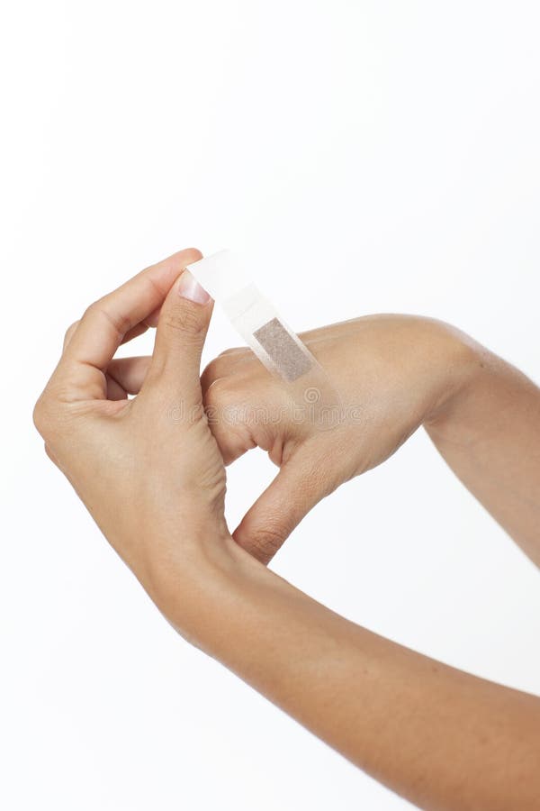 Adhesive bandage on hand stock photo. Image of fabric - 22321512