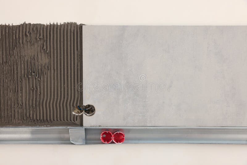 Adhesive Mix, Tile and Metal Stud on Wall, Closeup Stock Image - Image ...