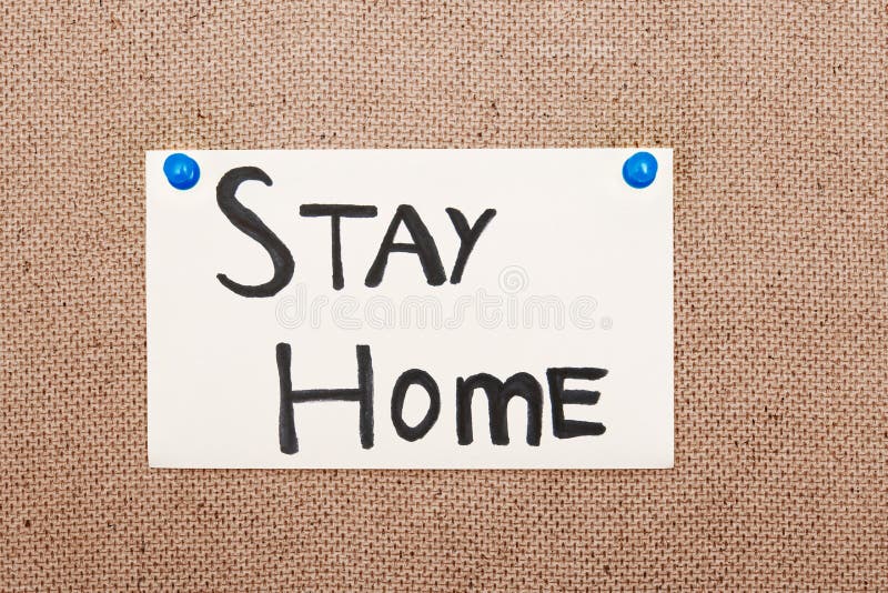 Adhesive Note with Stay Home Text Attached To the Bulletin Board by ...