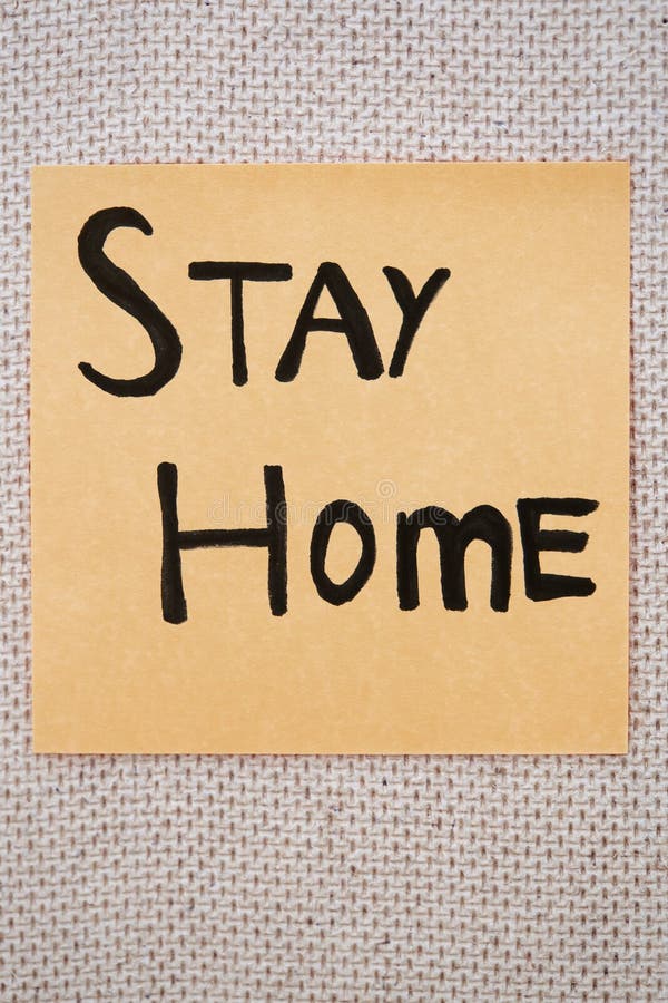Adhesive Note with Stay Home Text on a Bulletin Board Stock Image ...