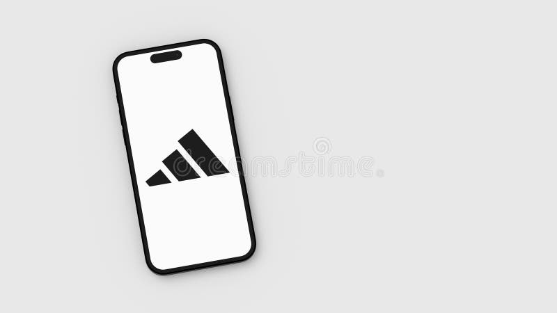 Adidas Logo on Mobile Phone Screen on Gray Background with Copy Space ...