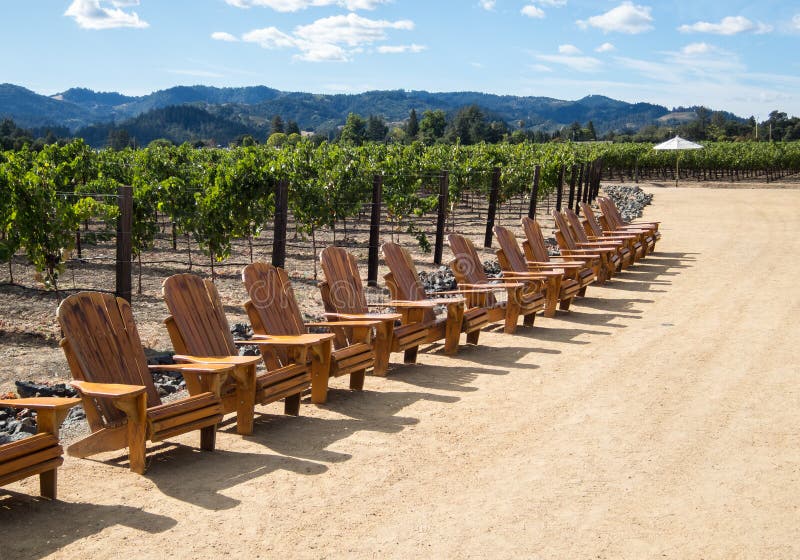 Long Line of Adirondack Chairs Stock Image - Image of modern, earthy ...