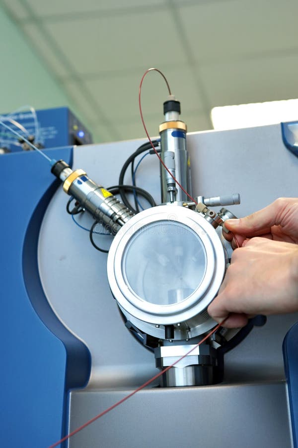 Adjust the Mass Spectrometer. the Man Analyzes the Device for De Stock ...