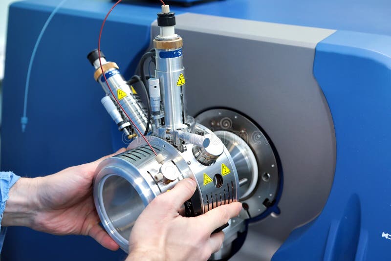 Adjust the Mass Spectrometer. the Man Analyzes the Device for De Stock ...