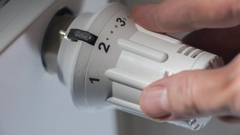 Adjust the Temperature on the Heating Radiator. Energy Saving Stock ...