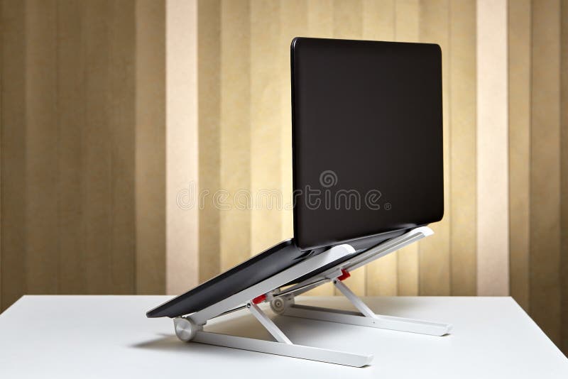 The Laptop is Open and Mounted on a Cooling Stand Stock Image - Image ...