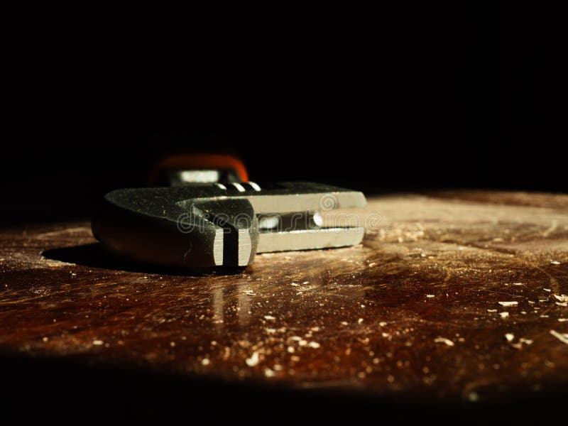 Adjustable Spanner on Dusty Old Table Stock Image - Image of wooden ...