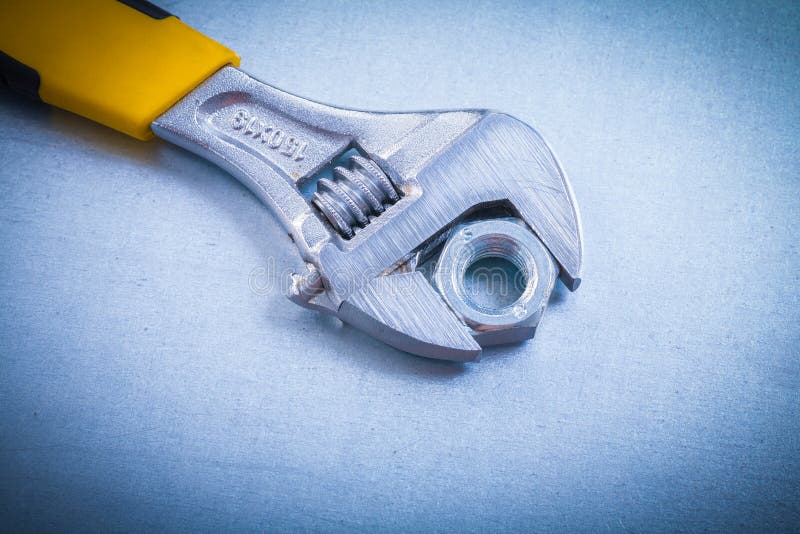 Adjustable Spanner and Threaded Nut on Stock Photo - Image of ...