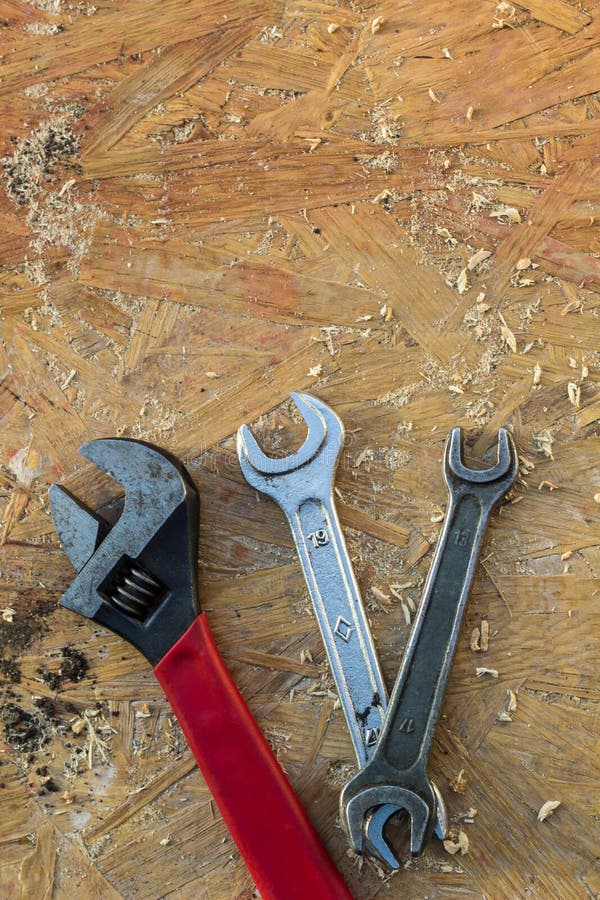 Adjustable Wrench, Spanner Tools on Wooden Table Stock Photo - Image of ...