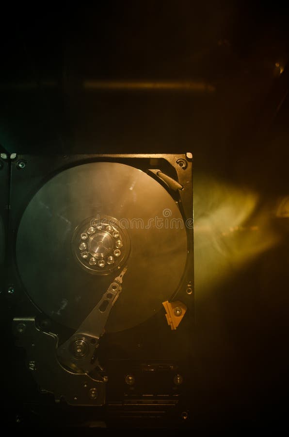 Adjustable Wrench Turn Off a Hard Disk. on a Dark Background Stock ...