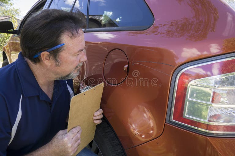 Adjuster Looking at Damage on Vehicle Stock Photo - Image of agent ...
