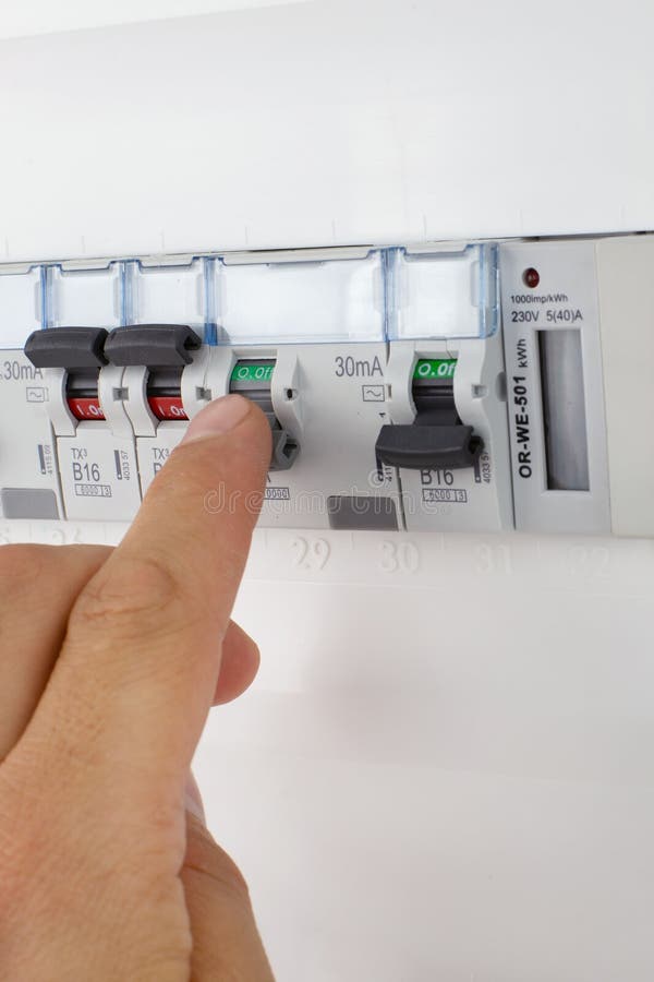 Adjusting Circuit Breaker in Electrical Panel Stock Photo - Image of ...