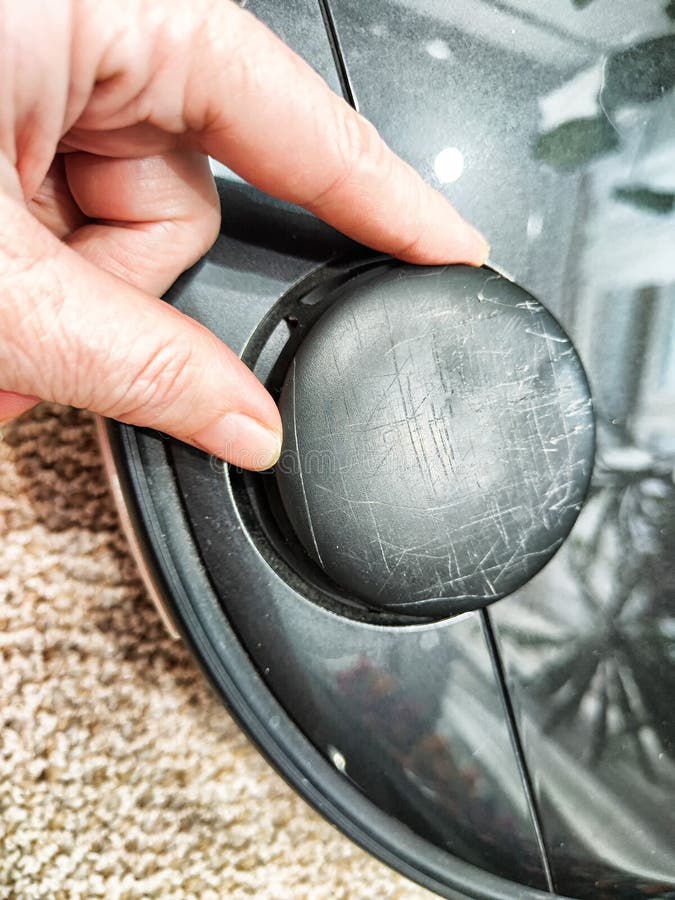 Adjusting the Control Knob on a Home Appliance To Change Settings for ...