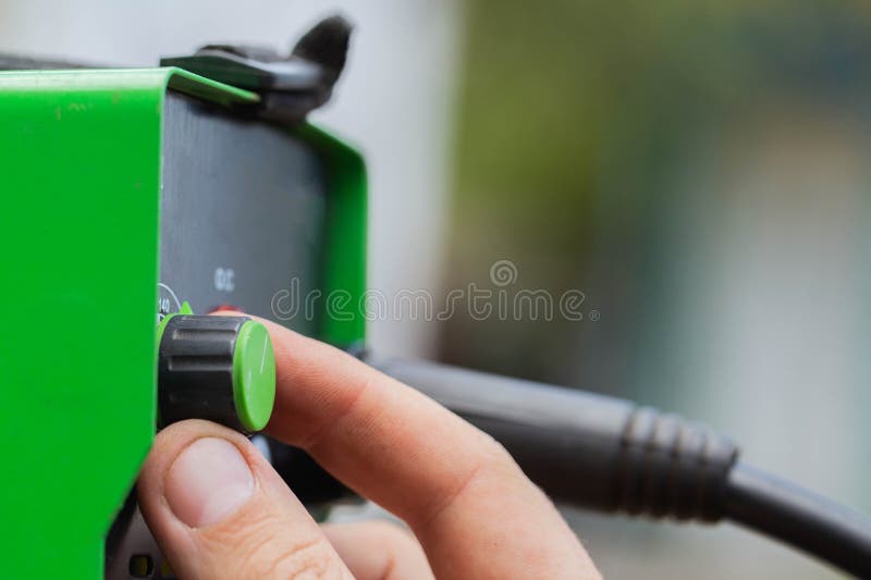 Adjusting the Current Strength on a Modern Welding Machine. Welding Arc ...