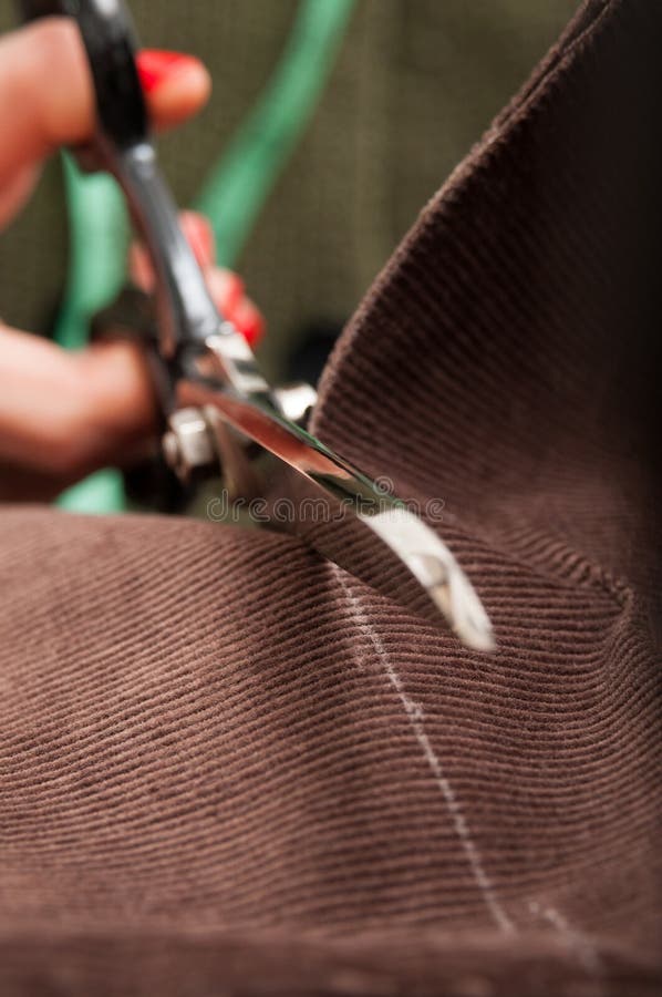 Adjusting garment stock image. Image of cloth, measuring - 65832525