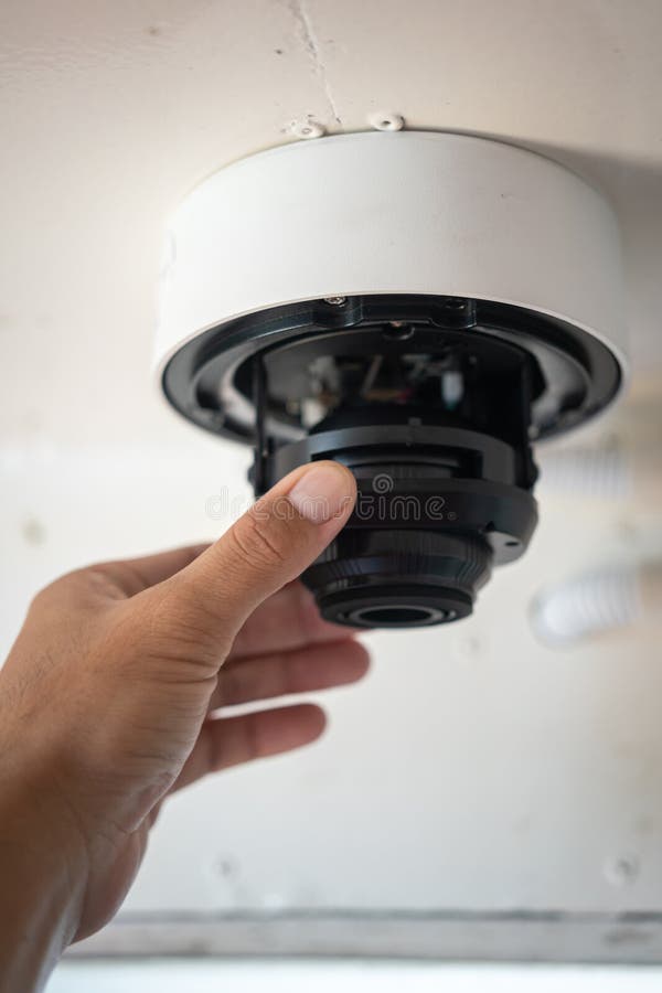 Adjusting for Installation of Security Camera Stock Image - Image of ...