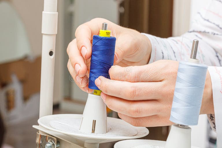Adjusting the Sewing Machine, Threads in Female Hands Stock Image ...