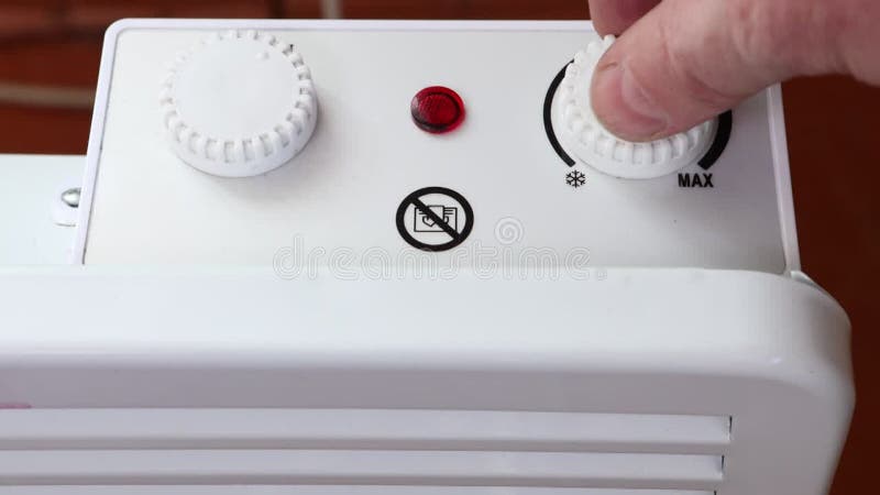 Adjusting Thermostat of Convector Heater To Control Temperature by ...