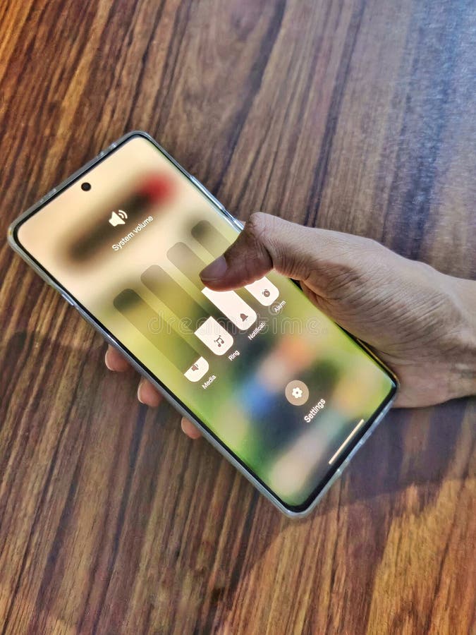 Adjusting Volume Bars on a Smartphone. Hand Tuning Music Equalizer ...