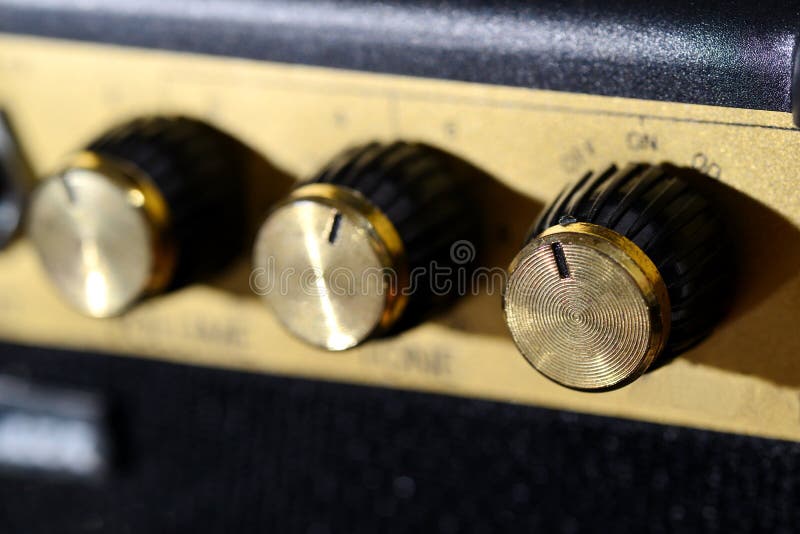 Adjusting a volume knob stock image. Image of showing - 51286667