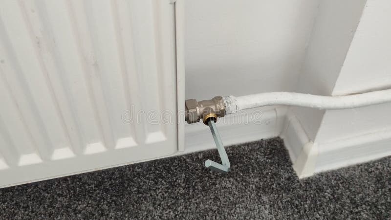Adjustment Key is Inserted into the Heating Radiator Regulator Stock ...