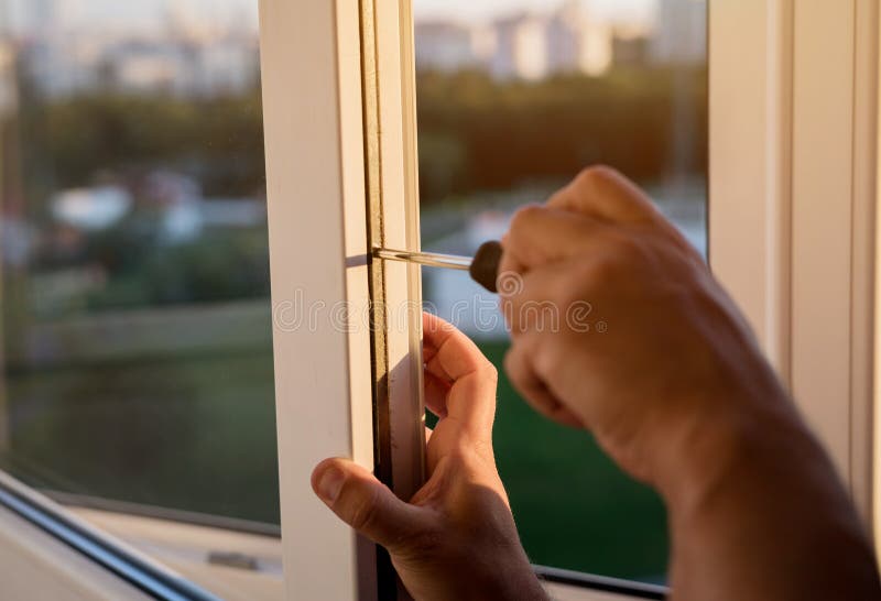 Adjustment of Windows by the Craftsman Stock Photo - Image of frame ...