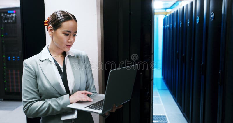 Administration, Laptop and Woman in Server Room for Cybersecurity, Network Maintenance or ...