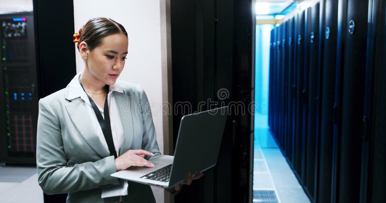 Administration, Laptop and Woman in Server Room for Cybersecurity, Network Maintenance or ...