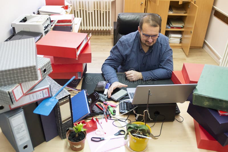An Administrative Worker Working in a State-owned Company with a ...