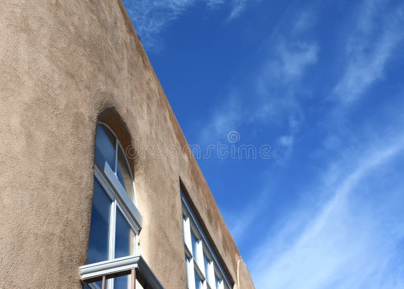 A Modern Adobe Building with Sky and Clouds Stock Photo - Image of view ...