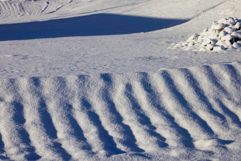 Snow Patterns and Shadows stock image. Image of pile - 270811739