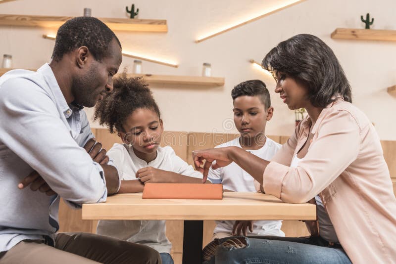 Adorable African-american Family Using Tablet Stock Photo - Image of ...