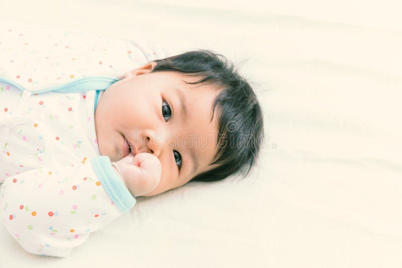 Adorable Asian Baby Sucking Thump Bed Growth Stock Photos - Free ...