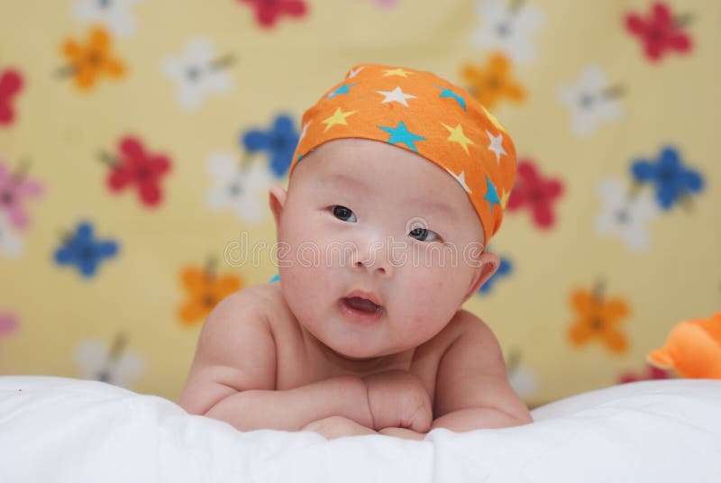 Chinese baby face smirking stock photo. Image of looking - 19376676