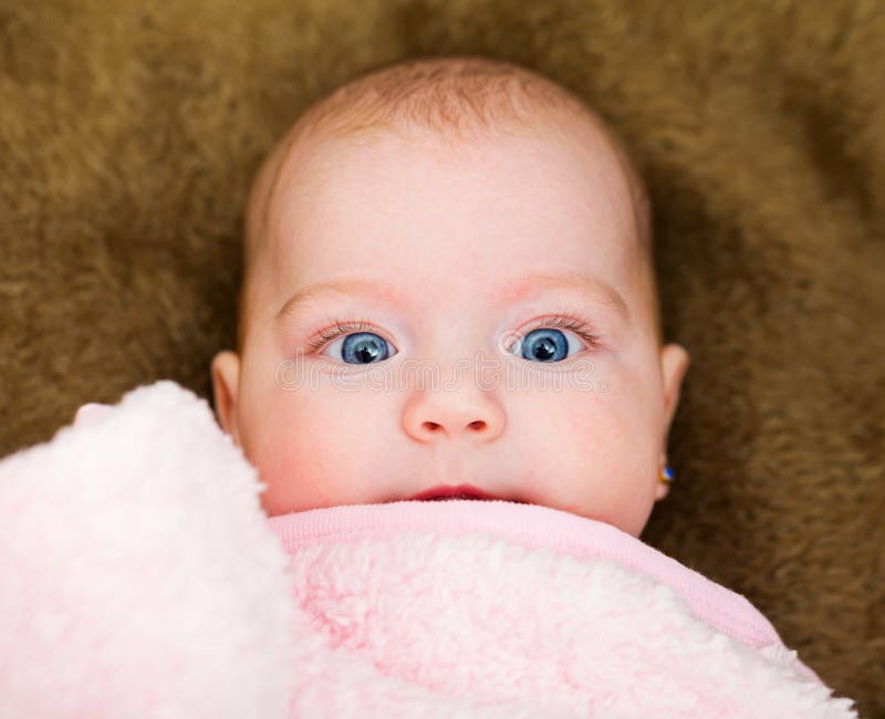 Cute Little Baby Looking into the Camera and Stock Image - Image of ...
