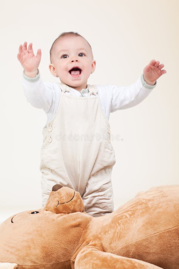 Adorable Baby with Bear Toy Stock Photo - Image of innocent, little ...