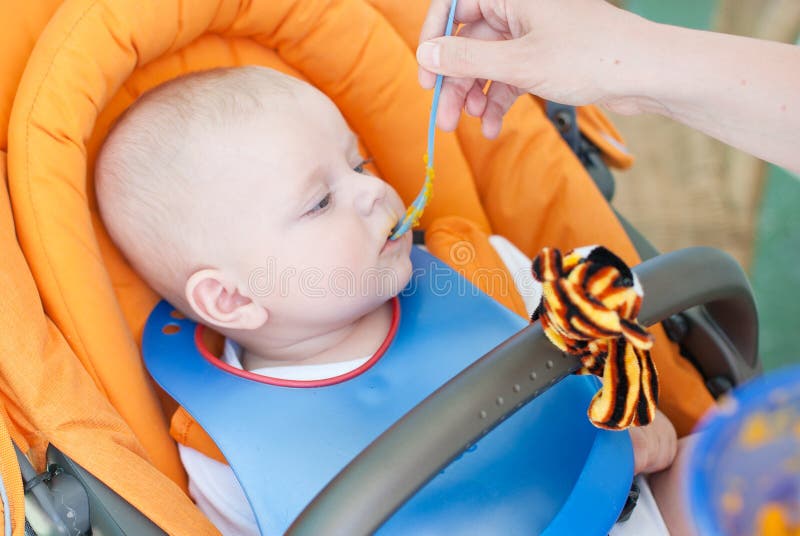 Adorable Baby Boy First Time Eating Meal Stock Image - Image of pink ...