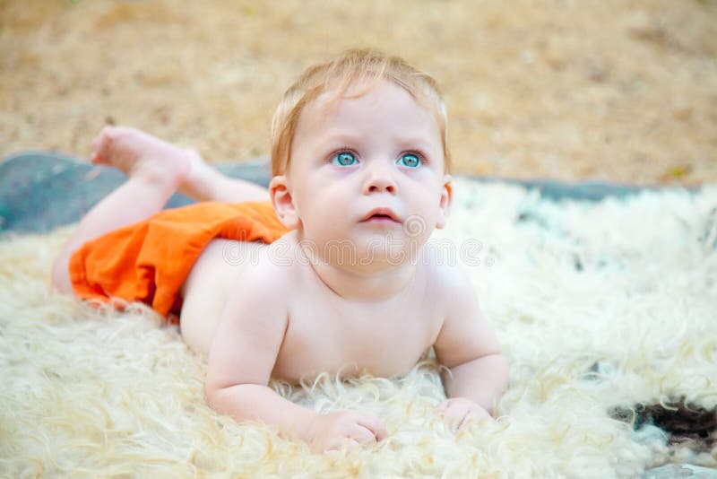 Adorable Baby Boy Looking Up Stock Image - Image of alone, hairy: 43268603