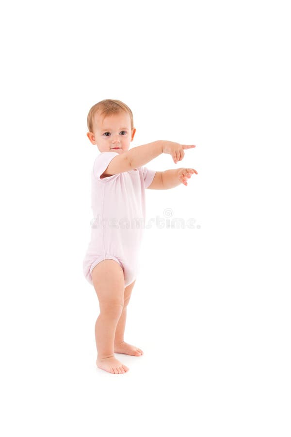 Baby girl with toy book stock image. Image of expression - 4861857