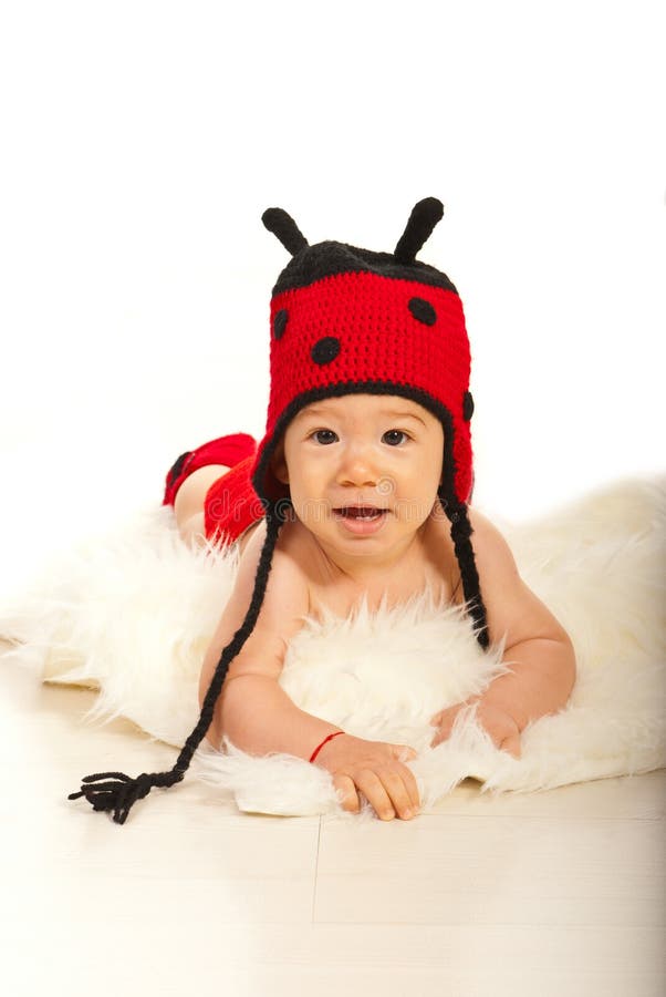 Adorable Baby in Ladybug Hat Stock Image - Image of funny, laying: 34129329