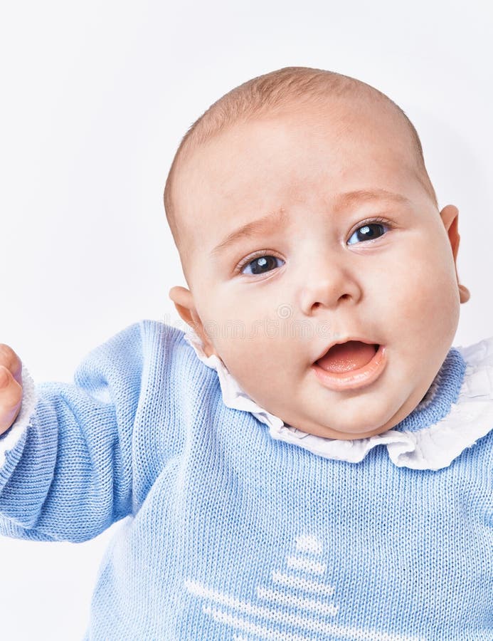 Adorable Baby Smiling Confident Lying on Bed Over White Isolated ...