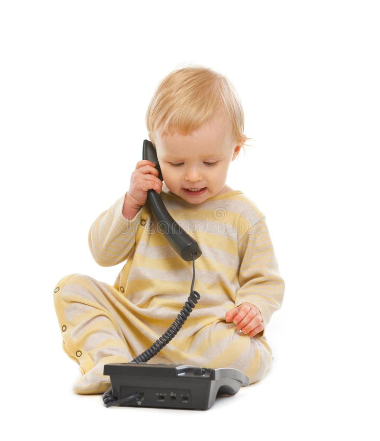 Adorable Baby Speaking On Phone On White Stock Image - Image: 23110031