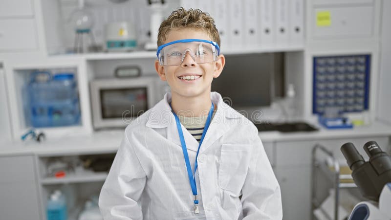 Adorable Blond Boy Scientist, Confidently Smiling while Working on an ...