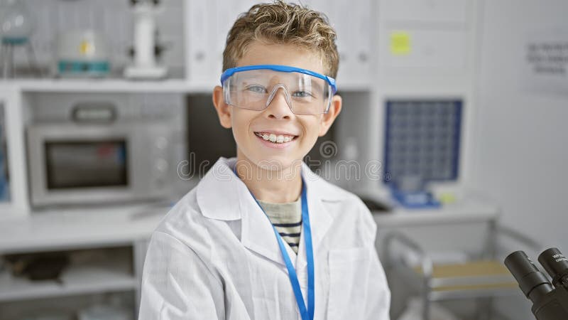 Adorable Blond Boy Scientist, Confidently Smiling while Working on an ...