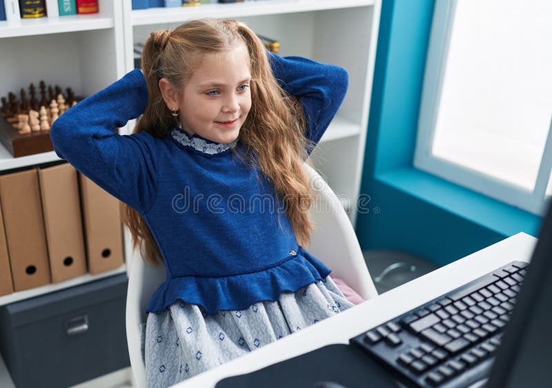 Adorable Blonde Girl Student Using Computer Resting with Hands on Head ...