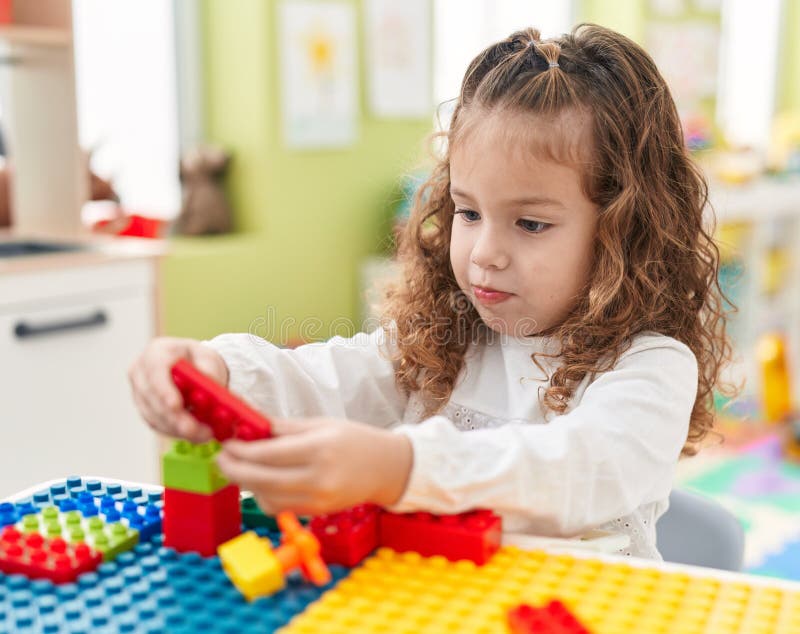 Adorable Blonde Toddler Playing with Construction Blocks Sitting on ...