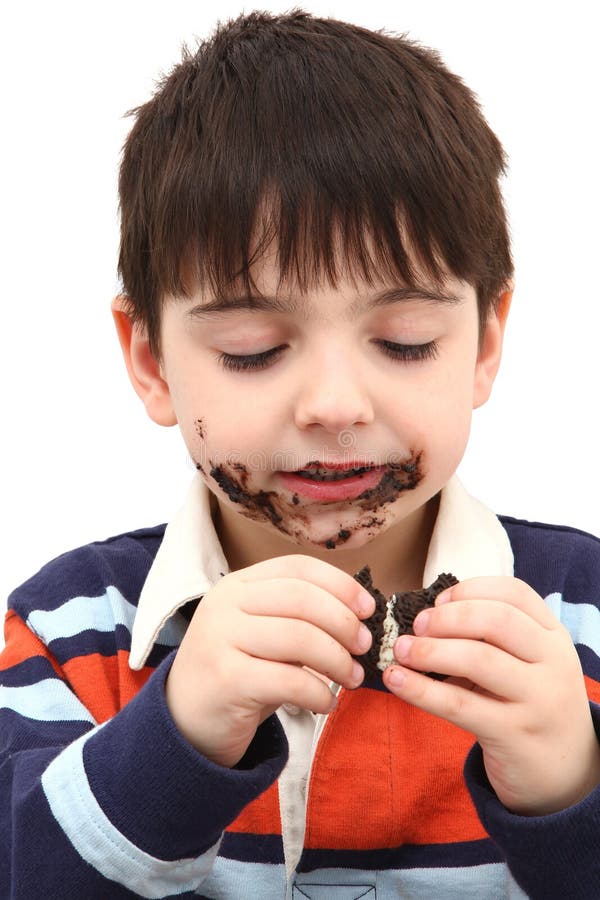 Adorable Boy Eating Cookies Stock Image - Image of cute, chocolate: 7782927