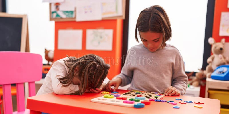 Adorable Boy and Girl Playing with Maths Puzzle Game Sitting on Table ...