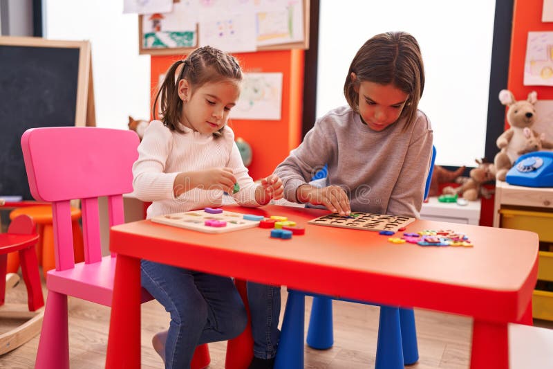 Adorable Boy and Girl Playing with Maths Puzzle Game Sitting on Table ...